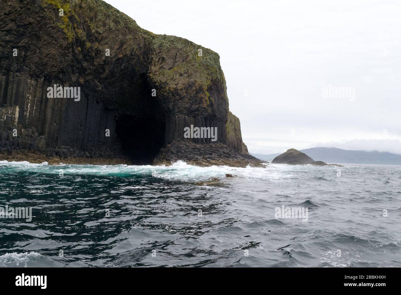 Staffa island seen from the ferry boat. It is a wild little isle closed ...
