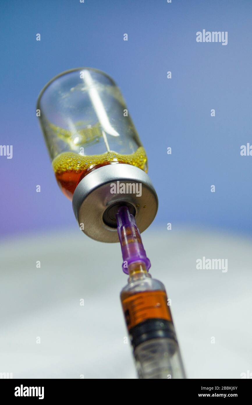 Close up vaccine vial needle dose flu vaccine drug syringe medical ...