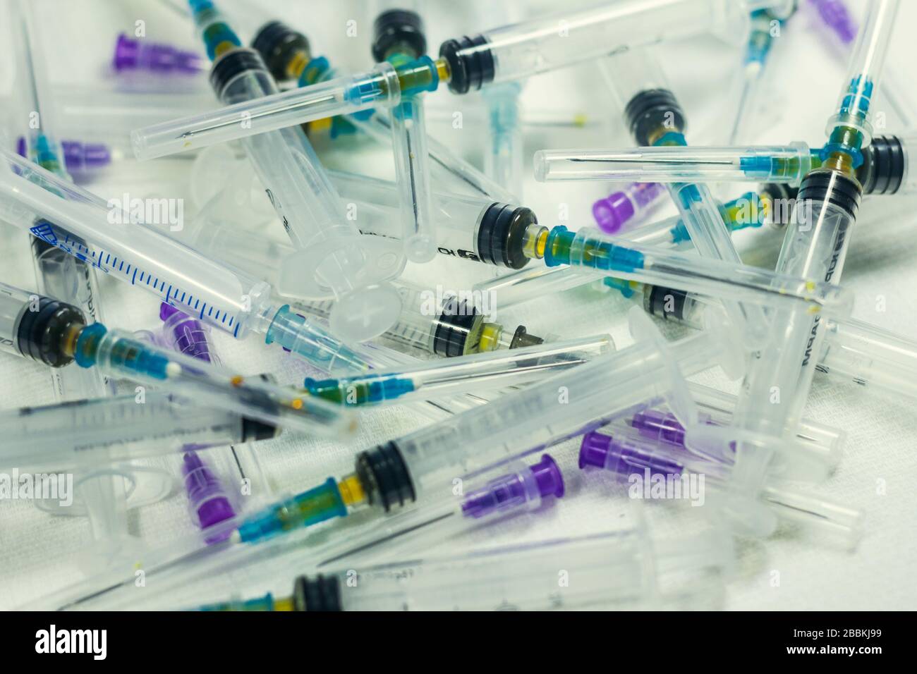Syringe with needle, used syringes Stock Photo - Alamy