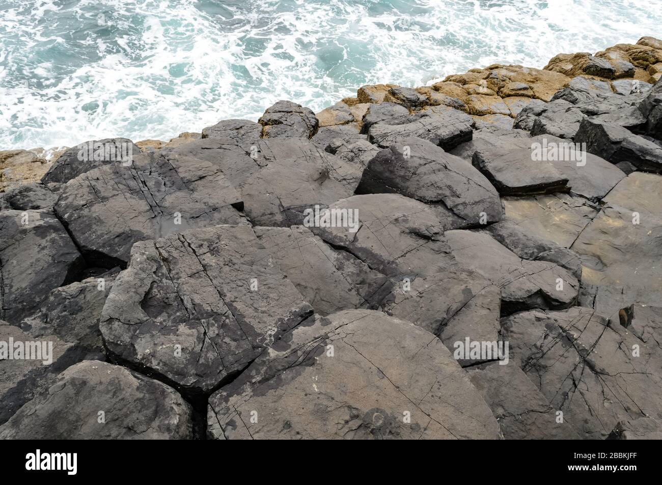 The characteristic volcanic hexagon shaped stones and rocks of the ...