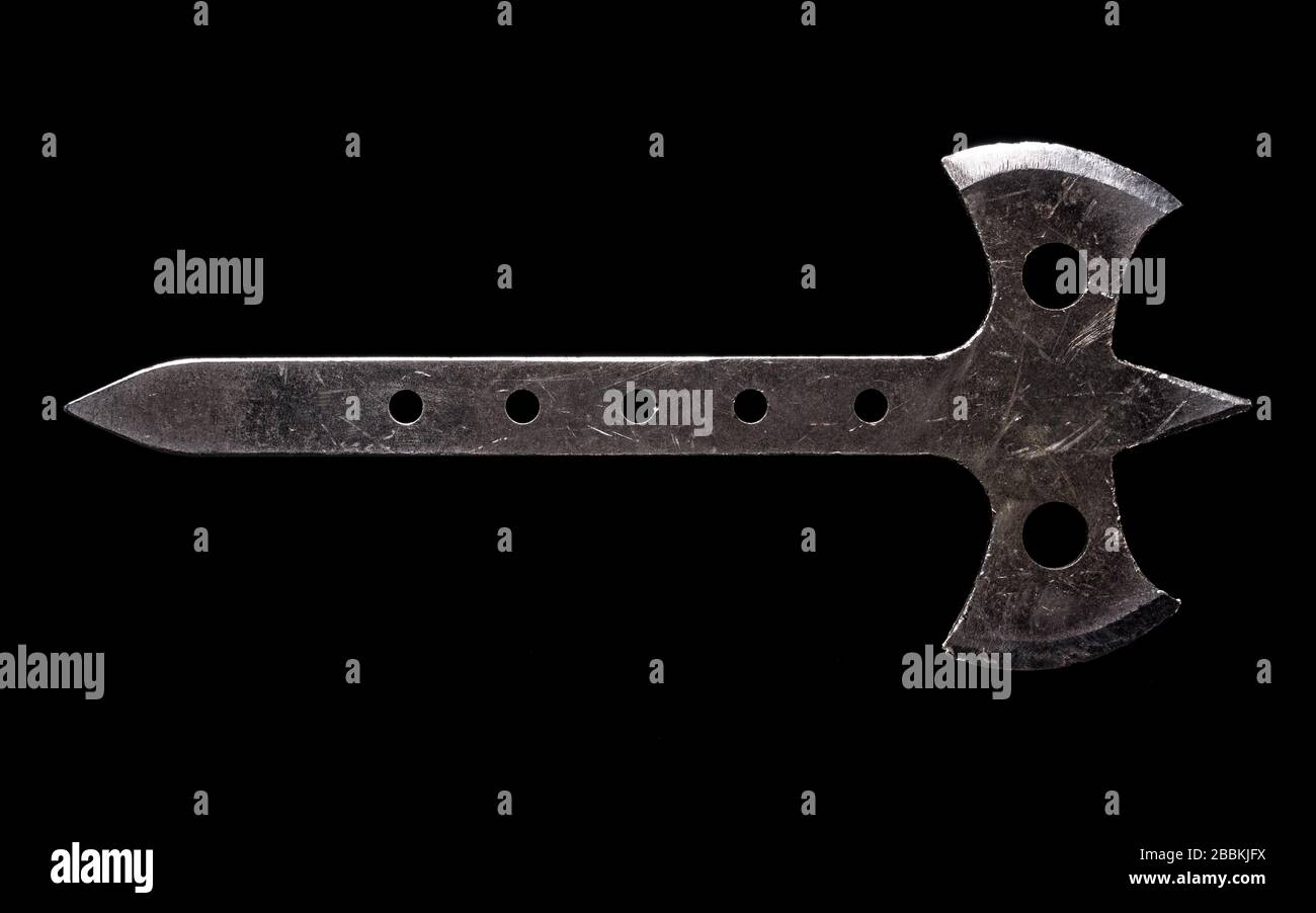 Scratched steel throwing axe on black background Stock Photo - Alamy