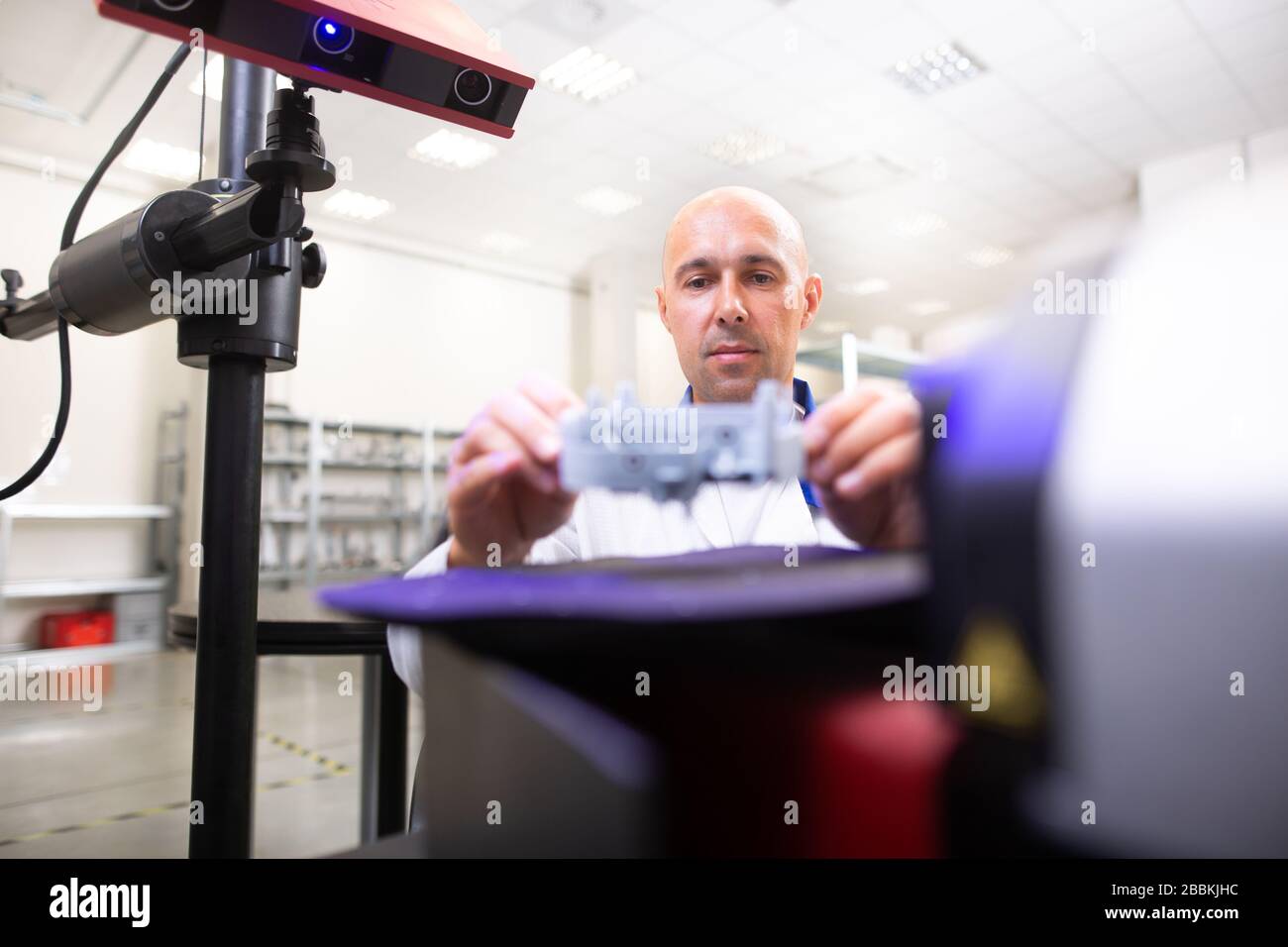 Quality control precision components hi-res stock photography and ...