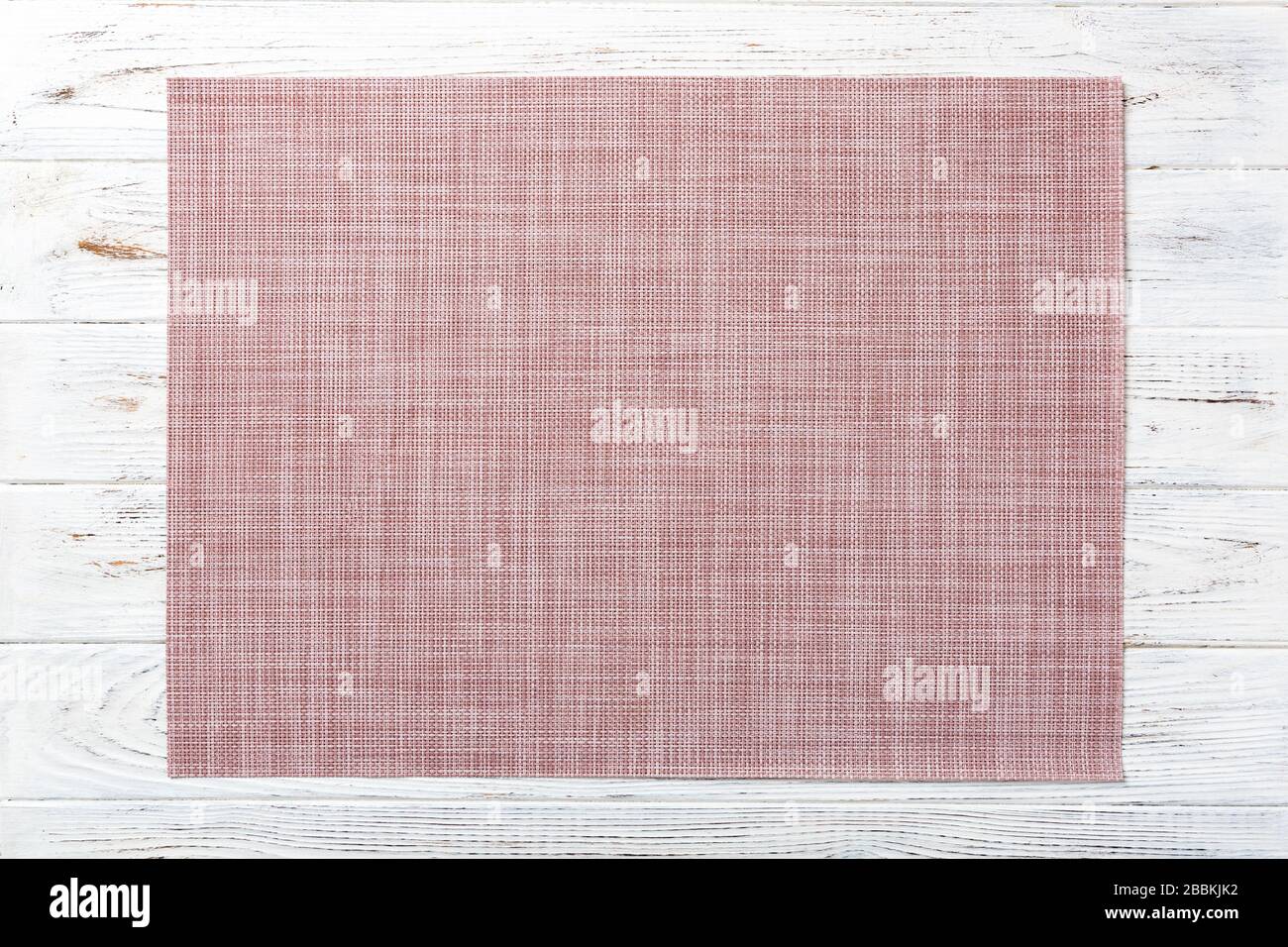 Top view of white table napkin on cement background. Place mat with ...