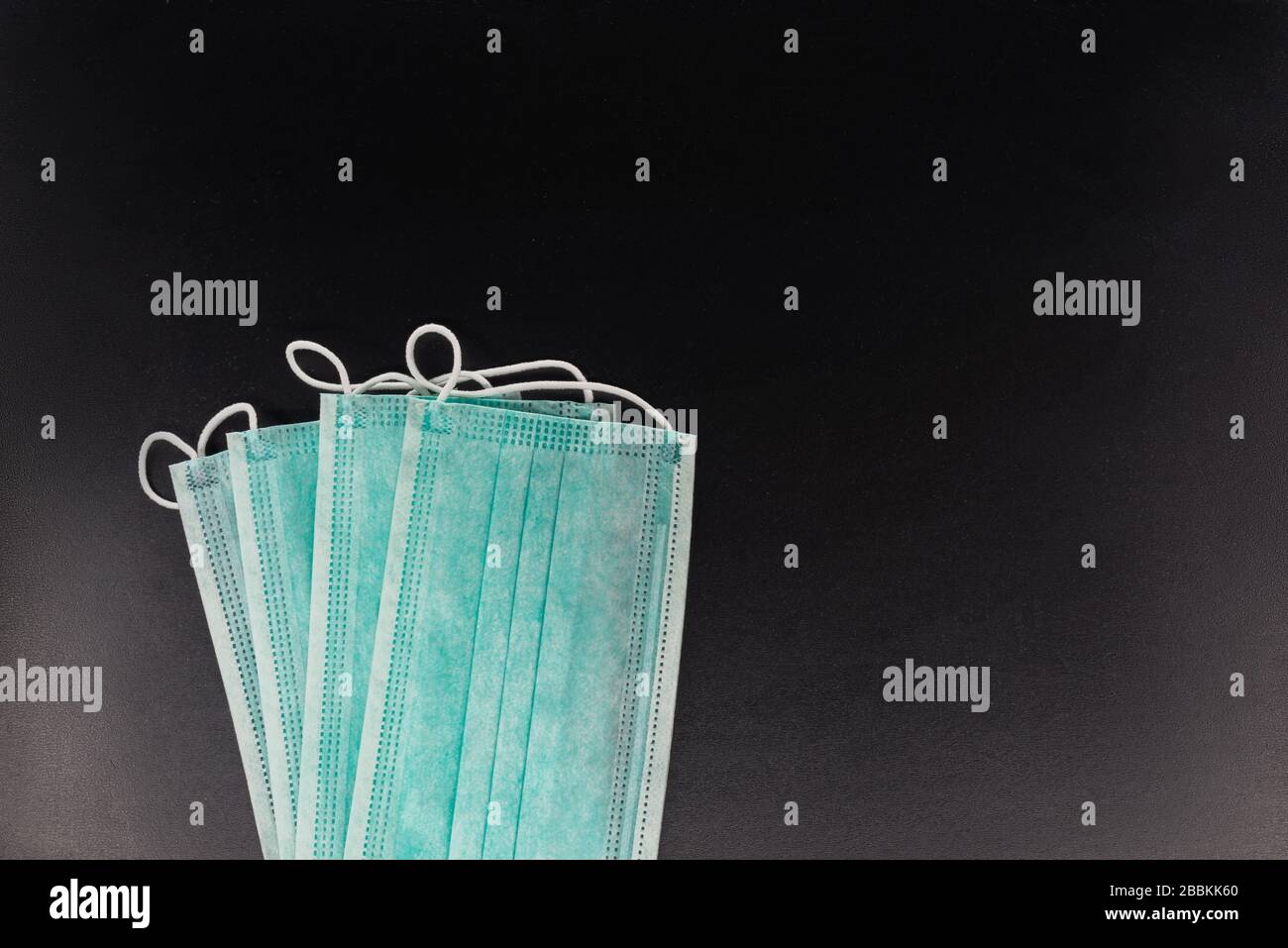 Surgical mask with rubber ear straps. Typical 3-ply surgical mask to ...