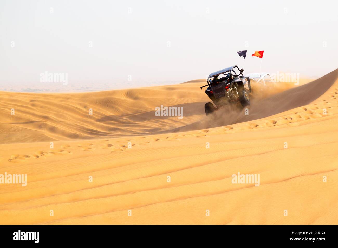 Sports rally in the sand dunes of the desert Stock Photo - Alamy