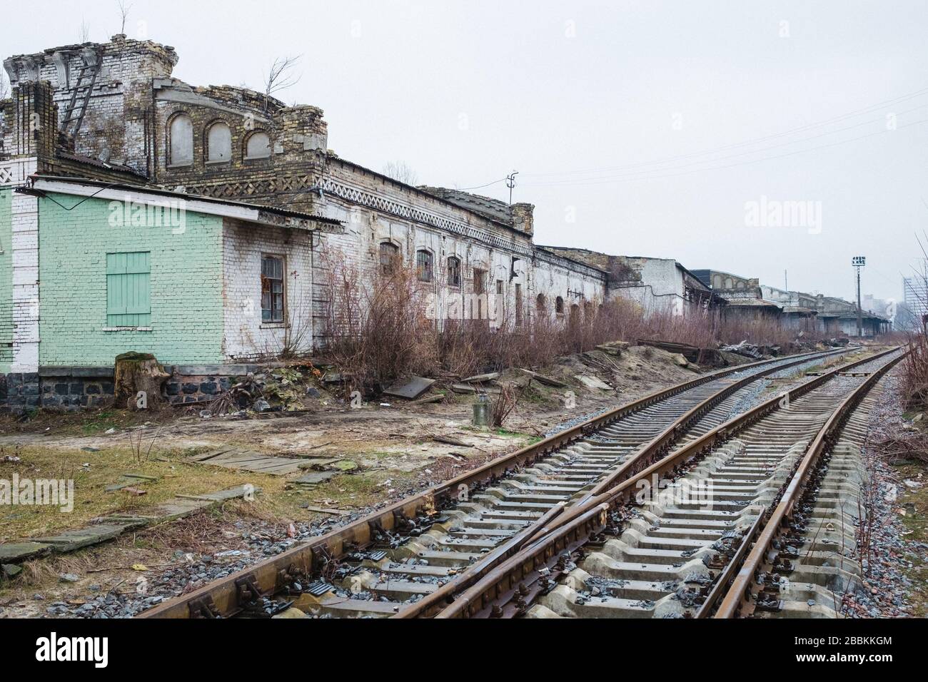 A view of an abandoned railroad station on a disused railroad Stock ...