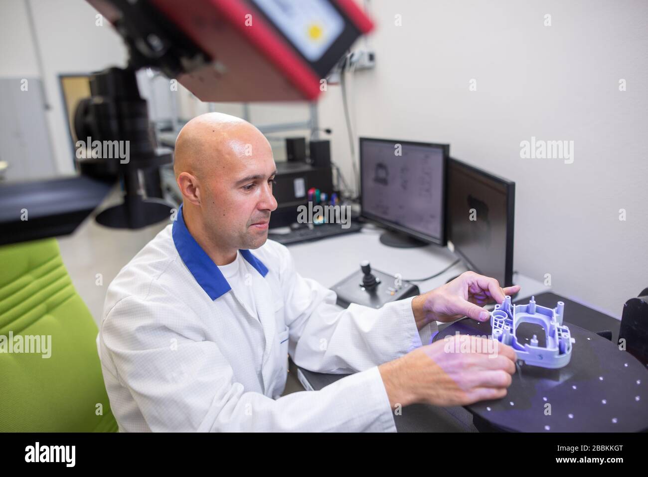Quality engineer, scanning components by professional optical 3D ...