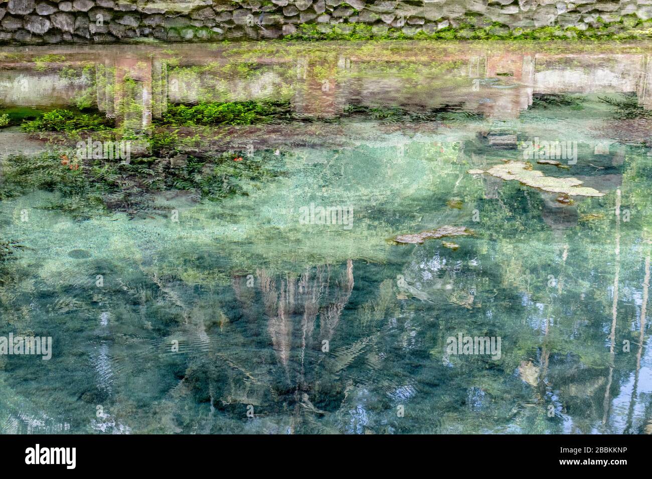 Pure holy water located in Tirta Empul in Bali Stock Photo - Alamy