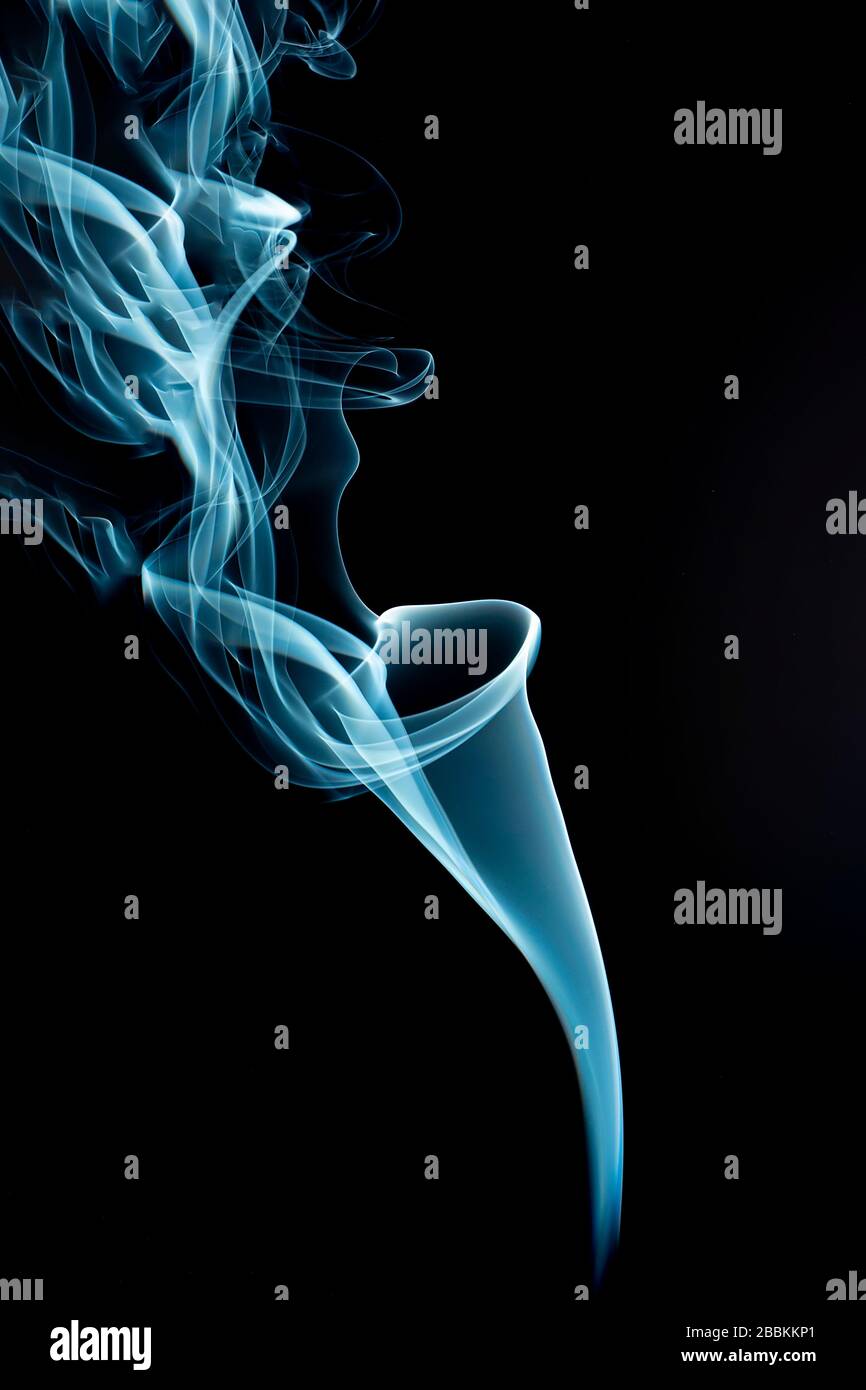 colored smoke shapes with black background Stock Photo - Alamy