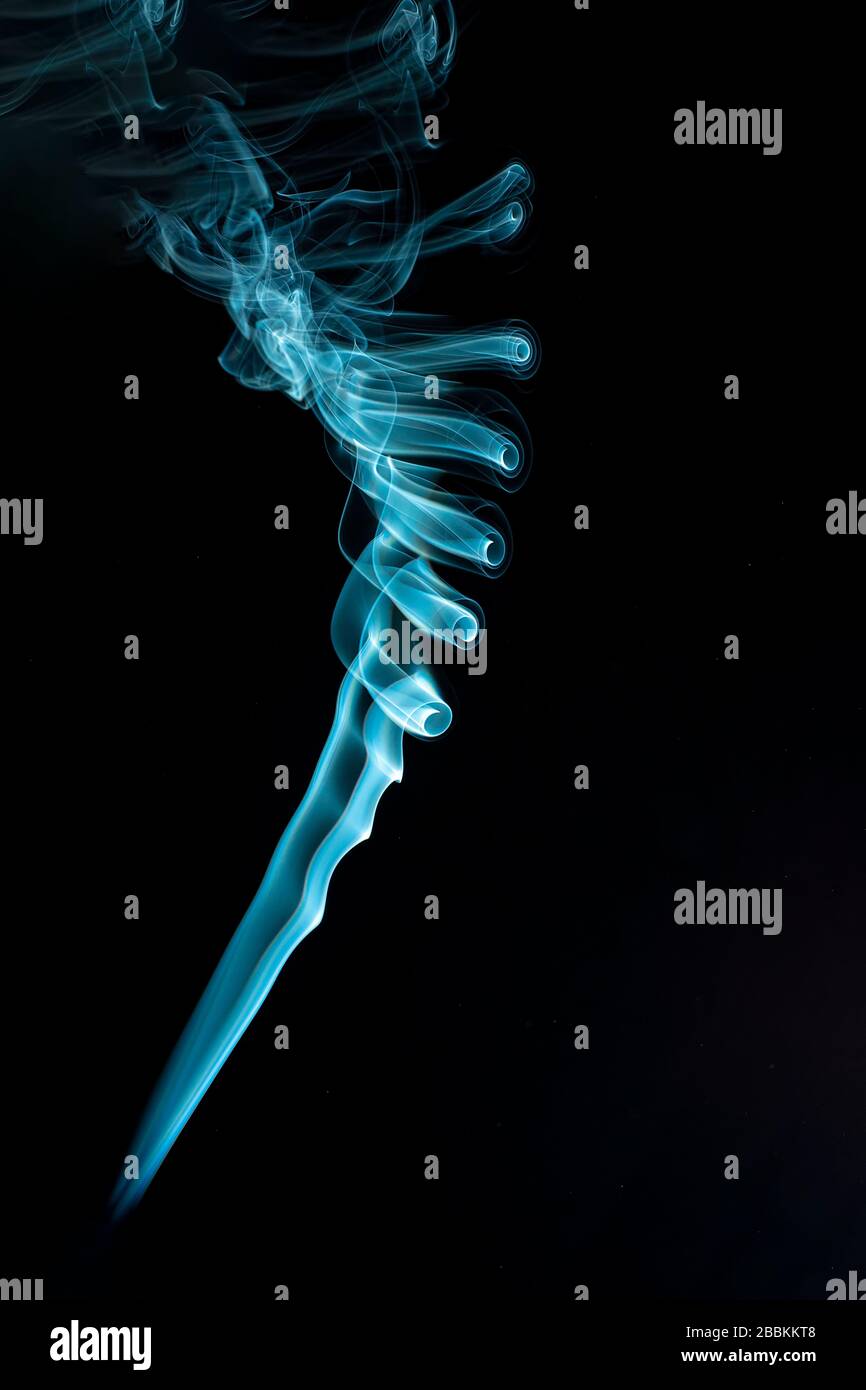 colored smoke shapes with black background Stock Photo - Alamy