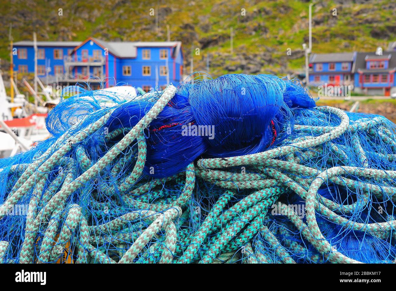 Blue fishing nets, Kamoyfjord Village, Mageroya Island, Finnmark Stock ...