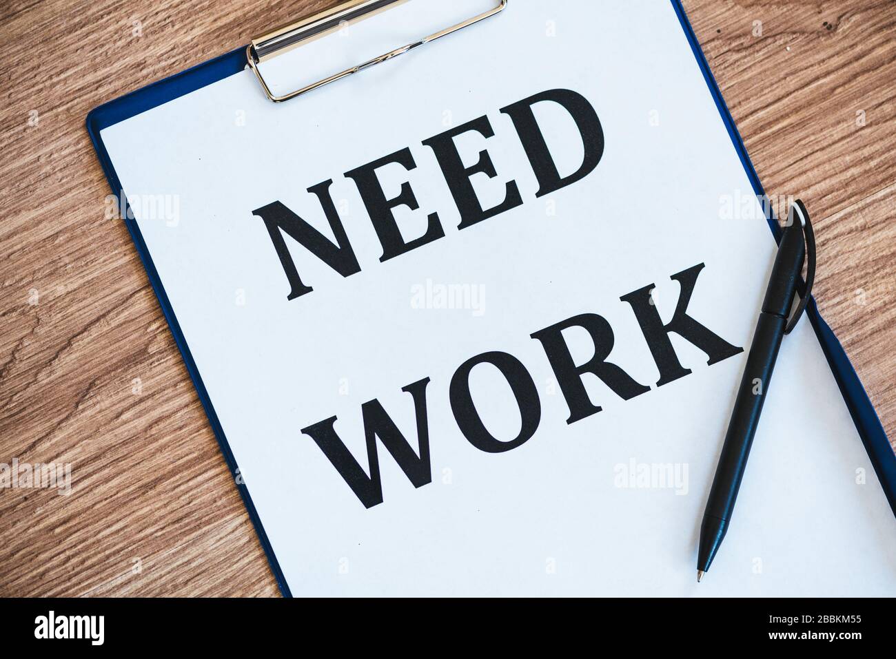 "Need work" sign on a board. Economic crisis concept. Unemployment ...