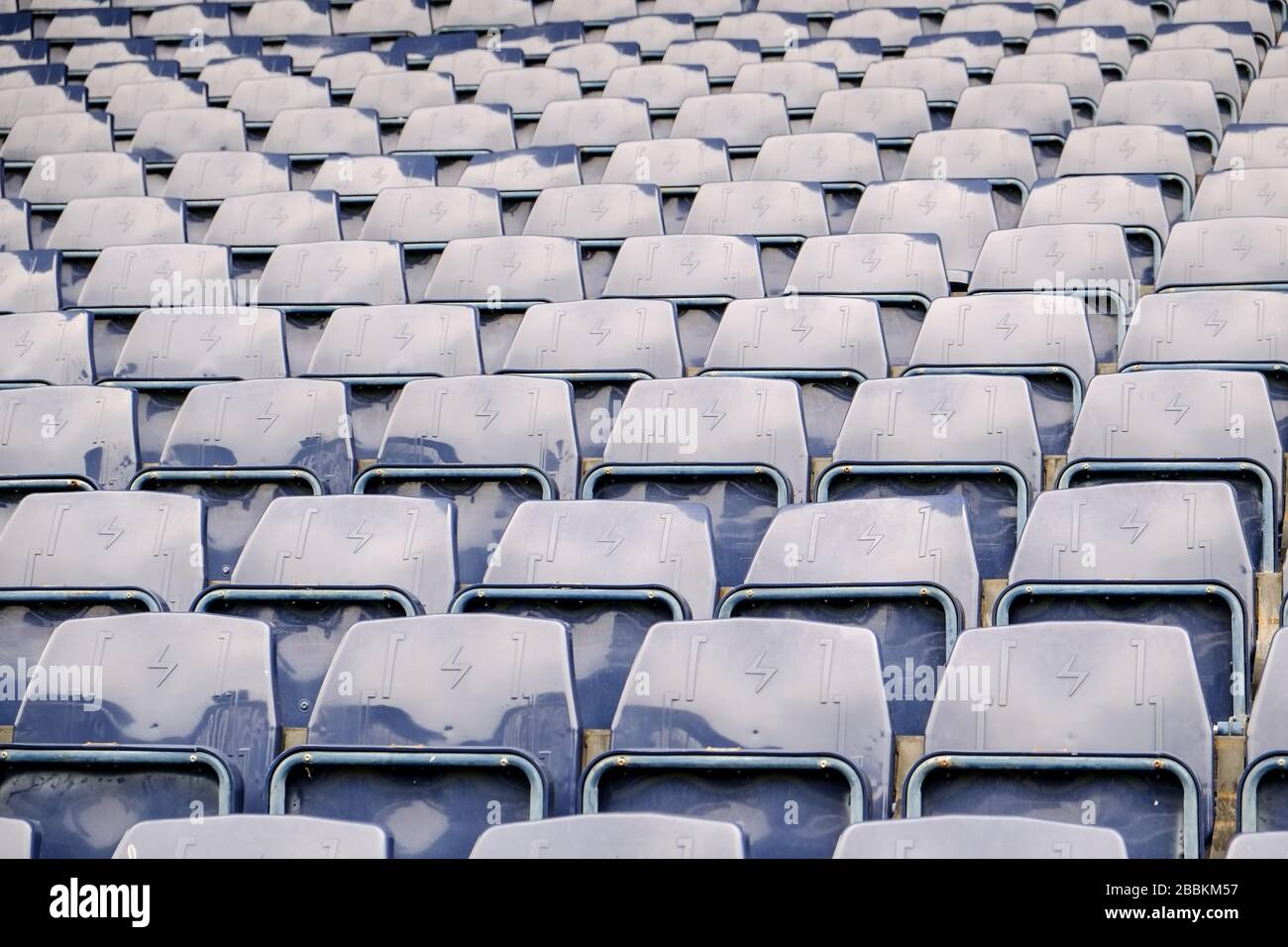 Navy blue amphitheater in football arena Stock Photo - Alamy