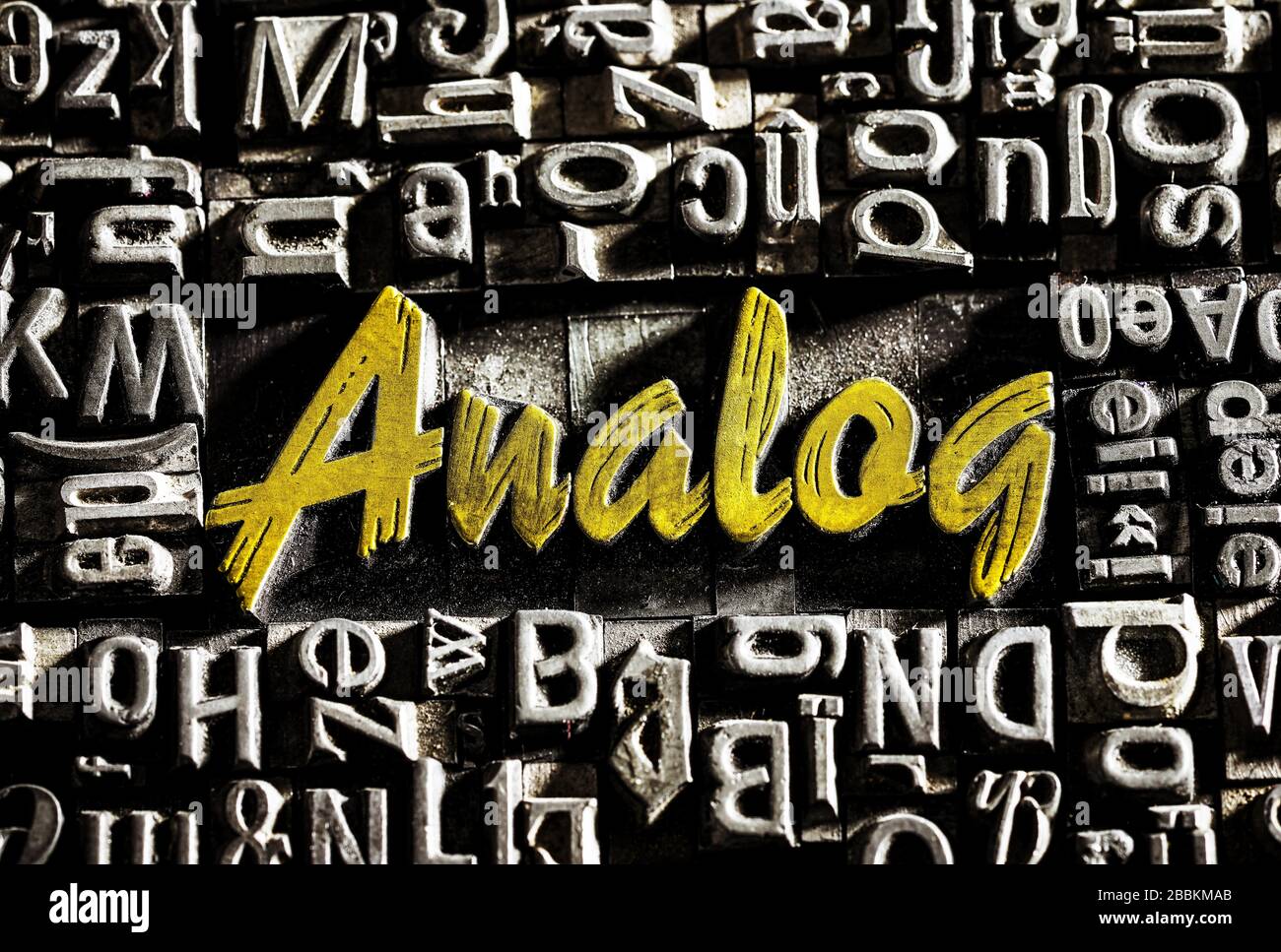 Old lead letters with golden writing show the word Analog, Germany ...