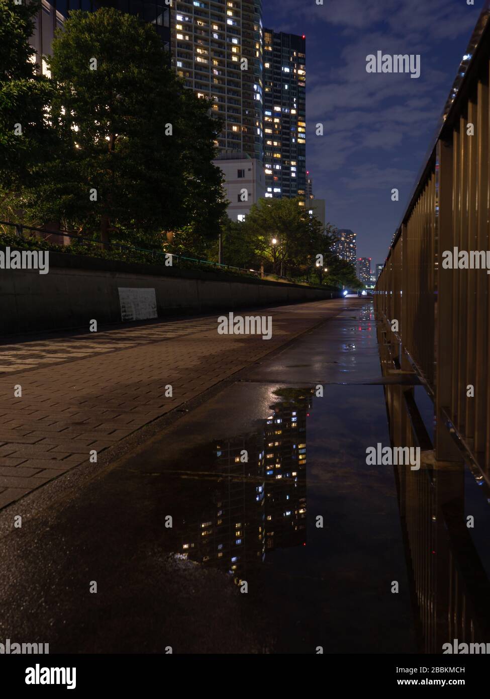 High rise buildings reflected in the rain in Tokyo Stock Photo - Alamy