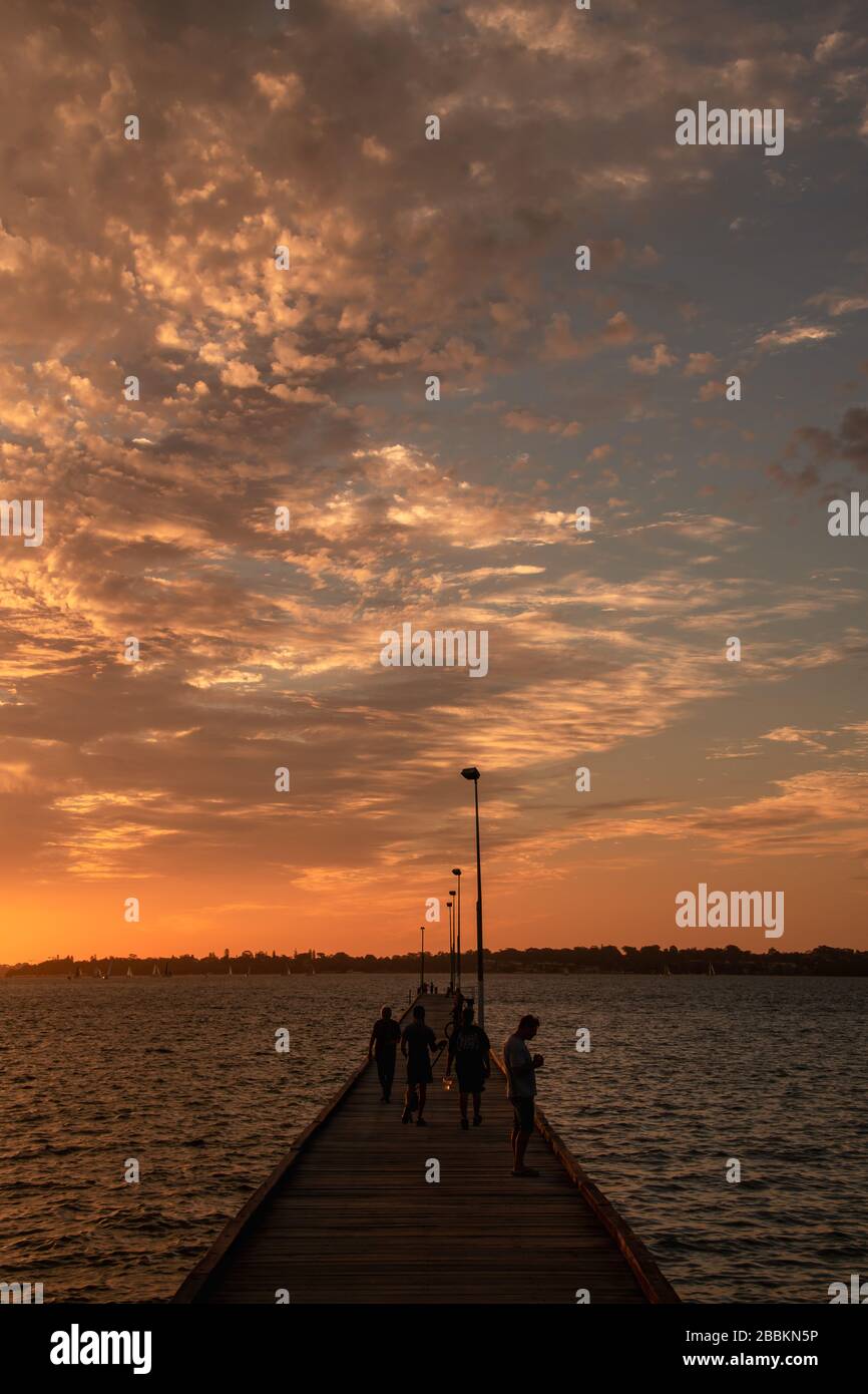 Fiery sunset over Como Jetty, Perth West Australia. Idyllic scene with ...