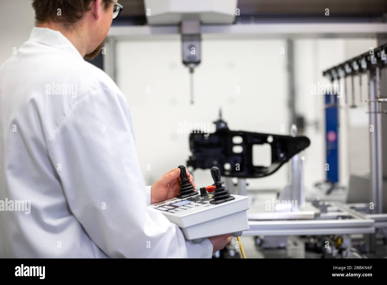 Quality engineer measuring some moldings by professional 3D measuring ...