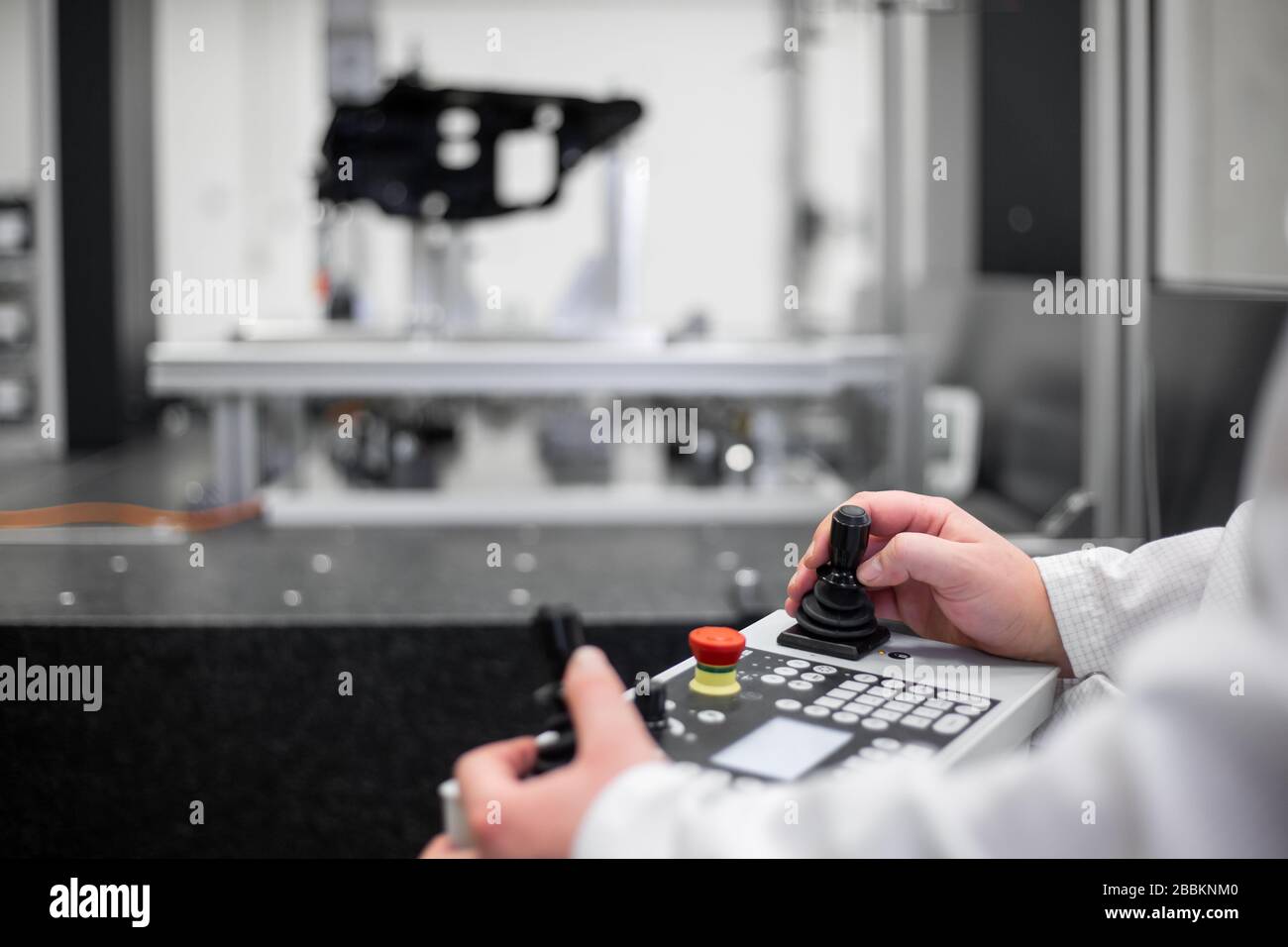 Quality engineer measuring some moldings by professional 3D measuring ...