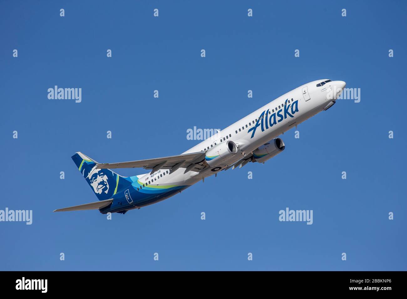 An Alaska Airlines Boeing 737-900 series aircraft departs after ...