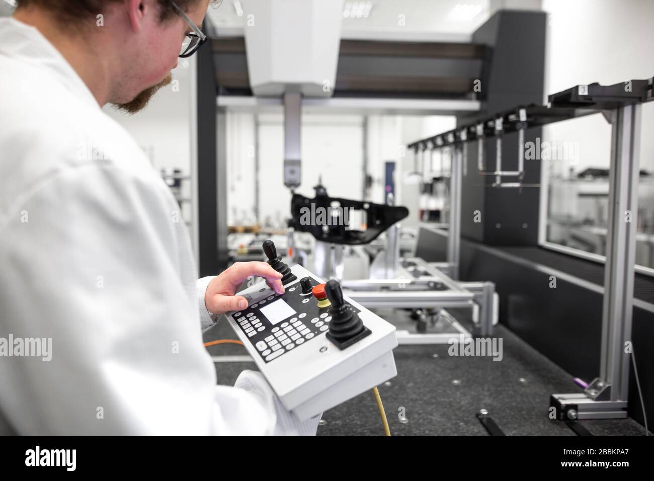 Quality engineer measuring some moldings by professional 3D measuring ...