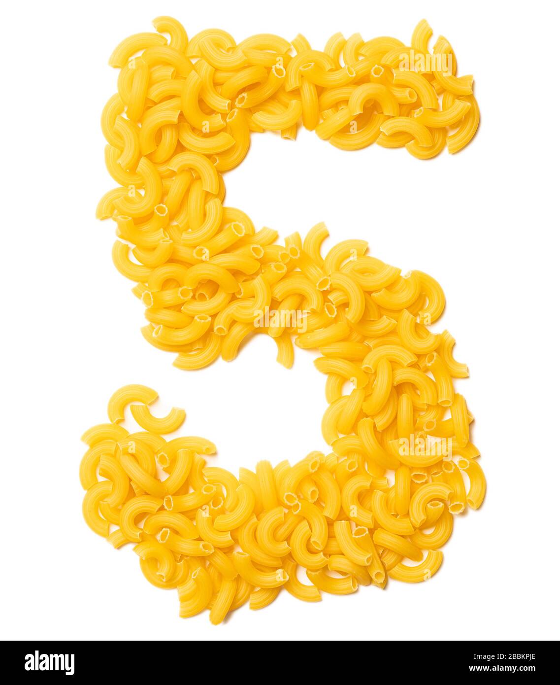 Arabic numeral "5" from dry pasta on a white isolated background. Food ...