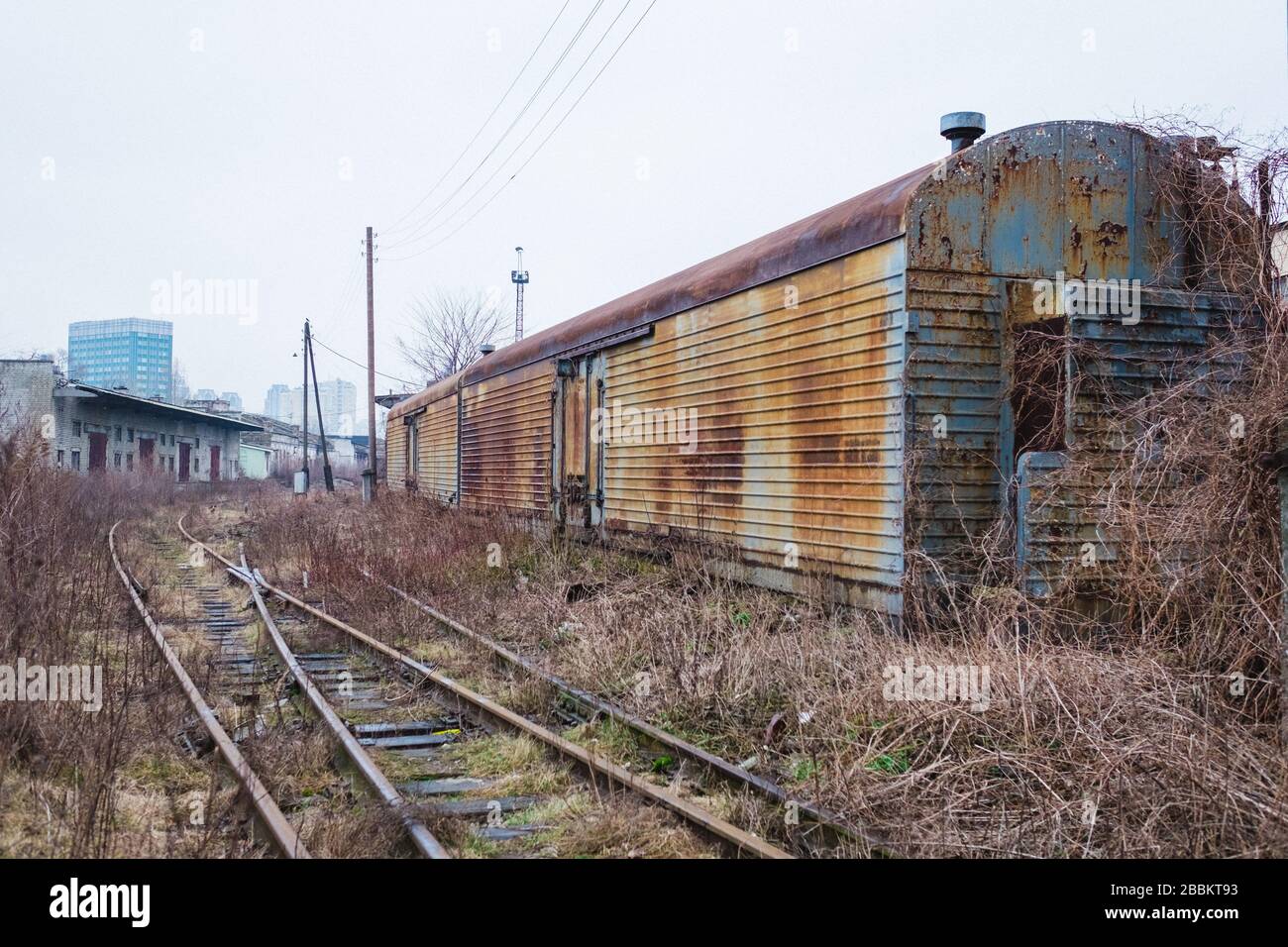 A view of an abandoned railroad station on a disused railroad Stock ...