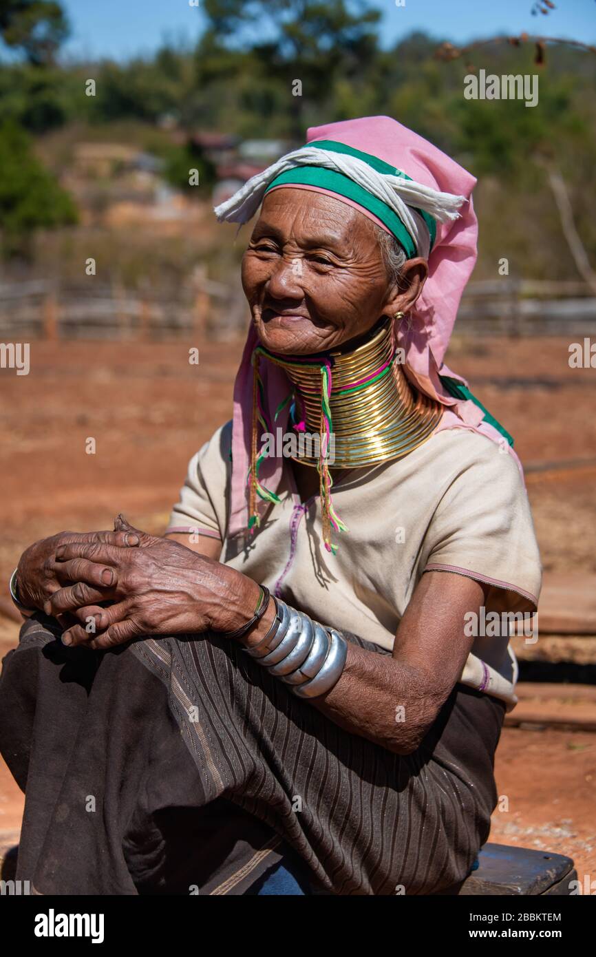 Pan Pet, Kayah State, Myanmar - February 2020: Portrait of an elderly Kayan longneck woman or ...