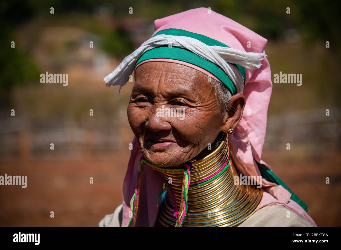 Pan Pet, Kayah State, Myanmar - February 2020: Portrait of an elderly Kayan longneck woman or ...