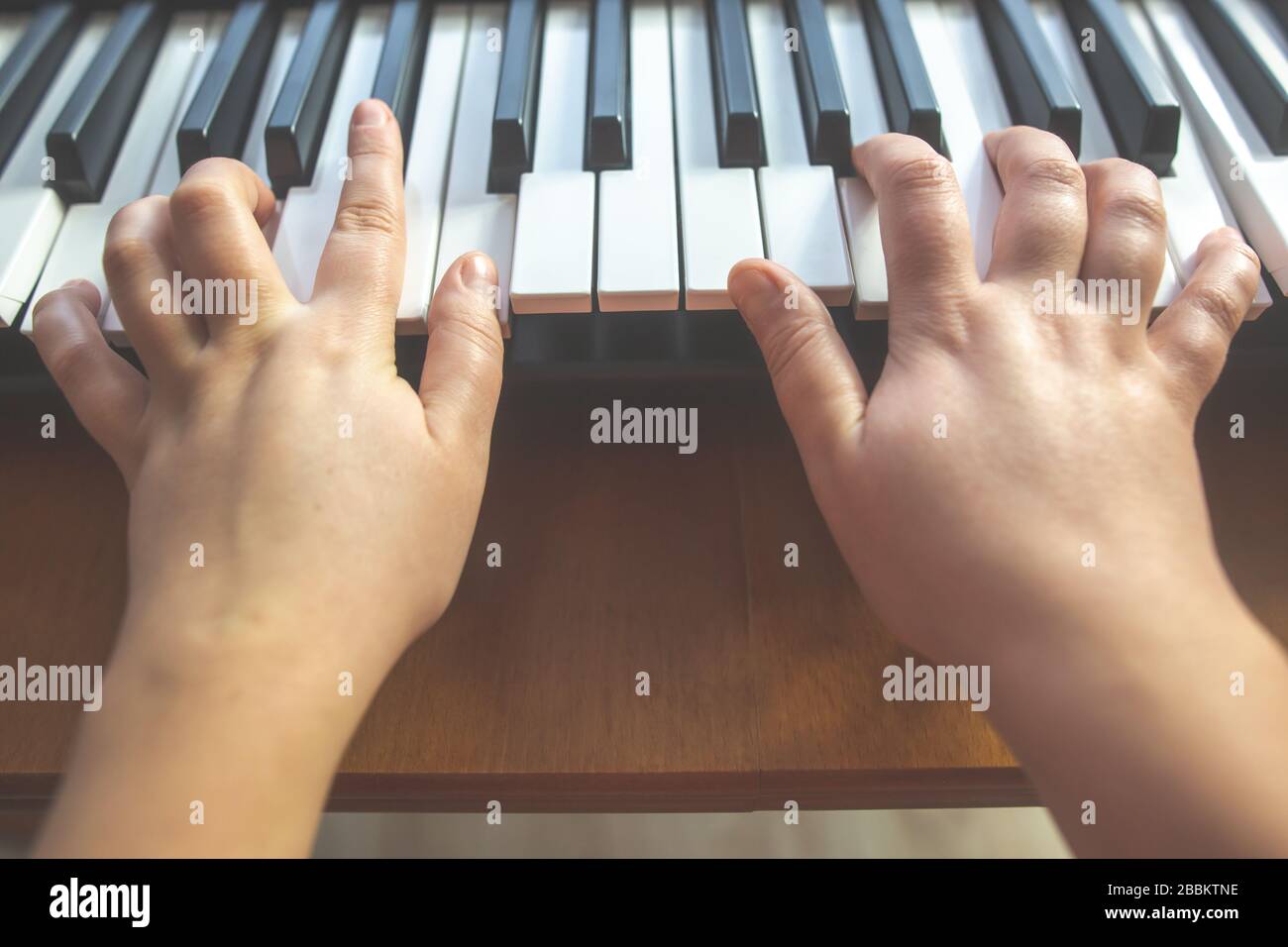 Close up of young woman hands playing on the piano, instrument Stock ...
