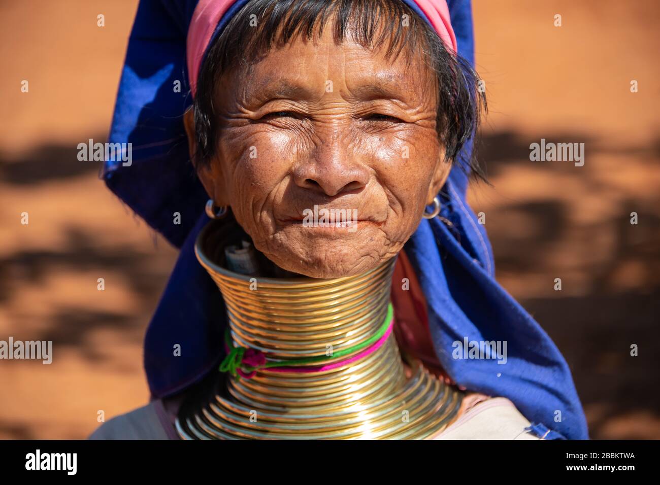 Pan Pet, Kayah State, Myanmar - February 2020: Portrait of an elderly Kayan longneck woman or ...