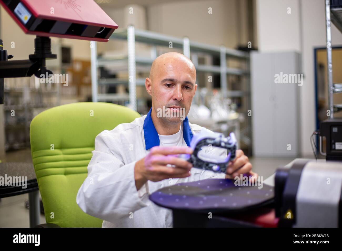 Quality engineer, scanning components by professional optical 3D ...