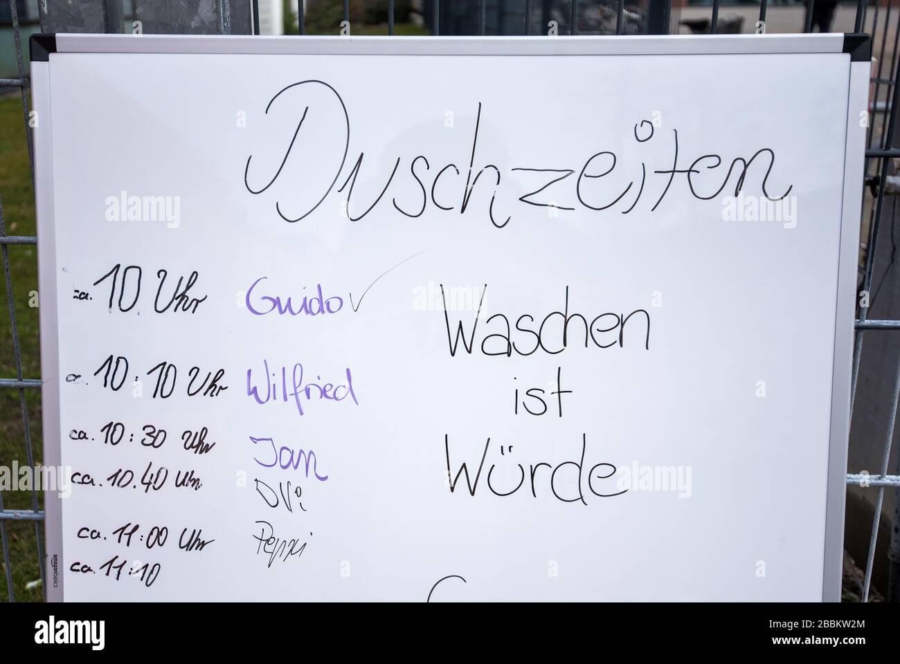 Hamburg, Germany. 01st Apr, 2020. A sign with the shower times for ...