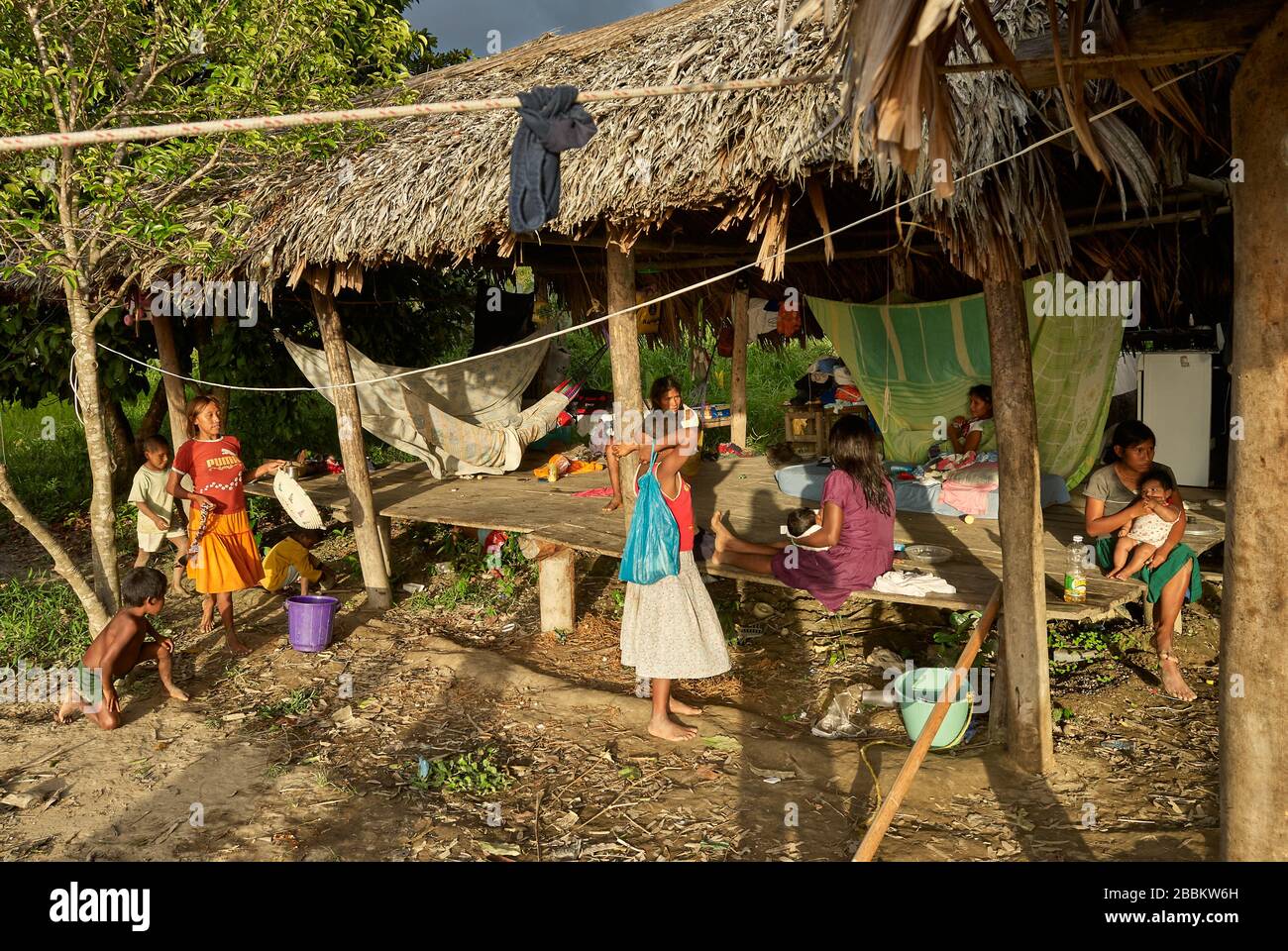 native people in wooden house on stilts of Warao indians, Orinoco-Delta ...
