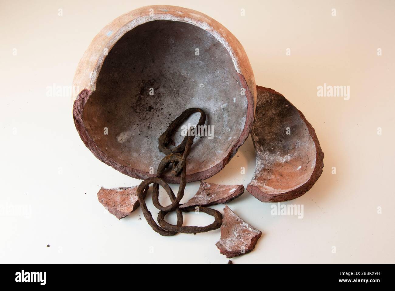 Old rustic chain inside broken clay pot Stock Photo - Alamy