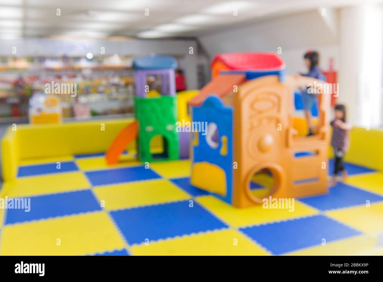 blurred image of children playground activities in hall Stock Photo - Alamy