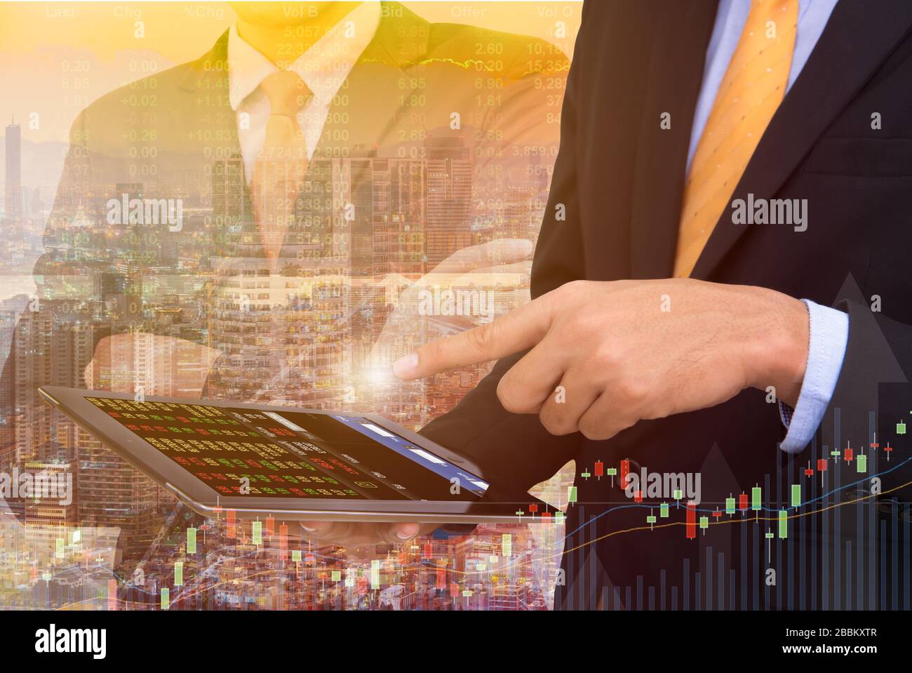 business man Trading concept using the tablet with financial graph on ...