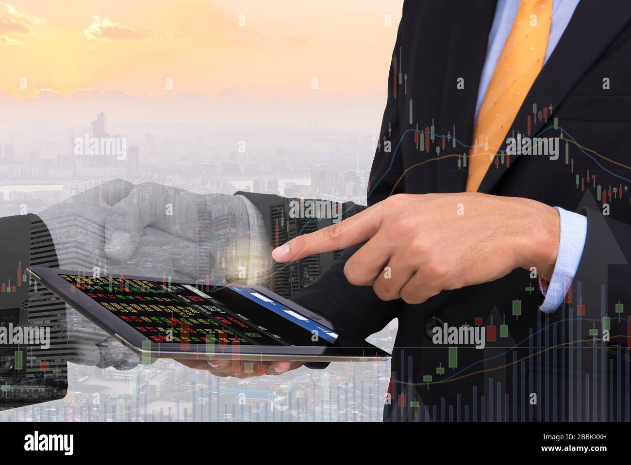 business man Trading concept using the tablet with financial graph on ...