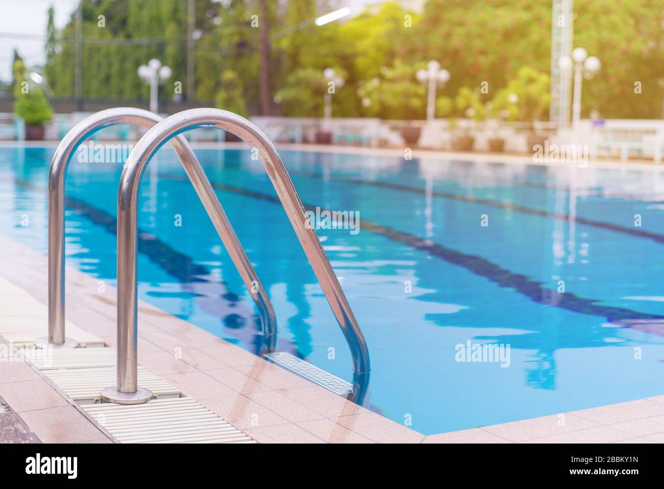swimming pool with stair at sport center Stock Photo - Alamy