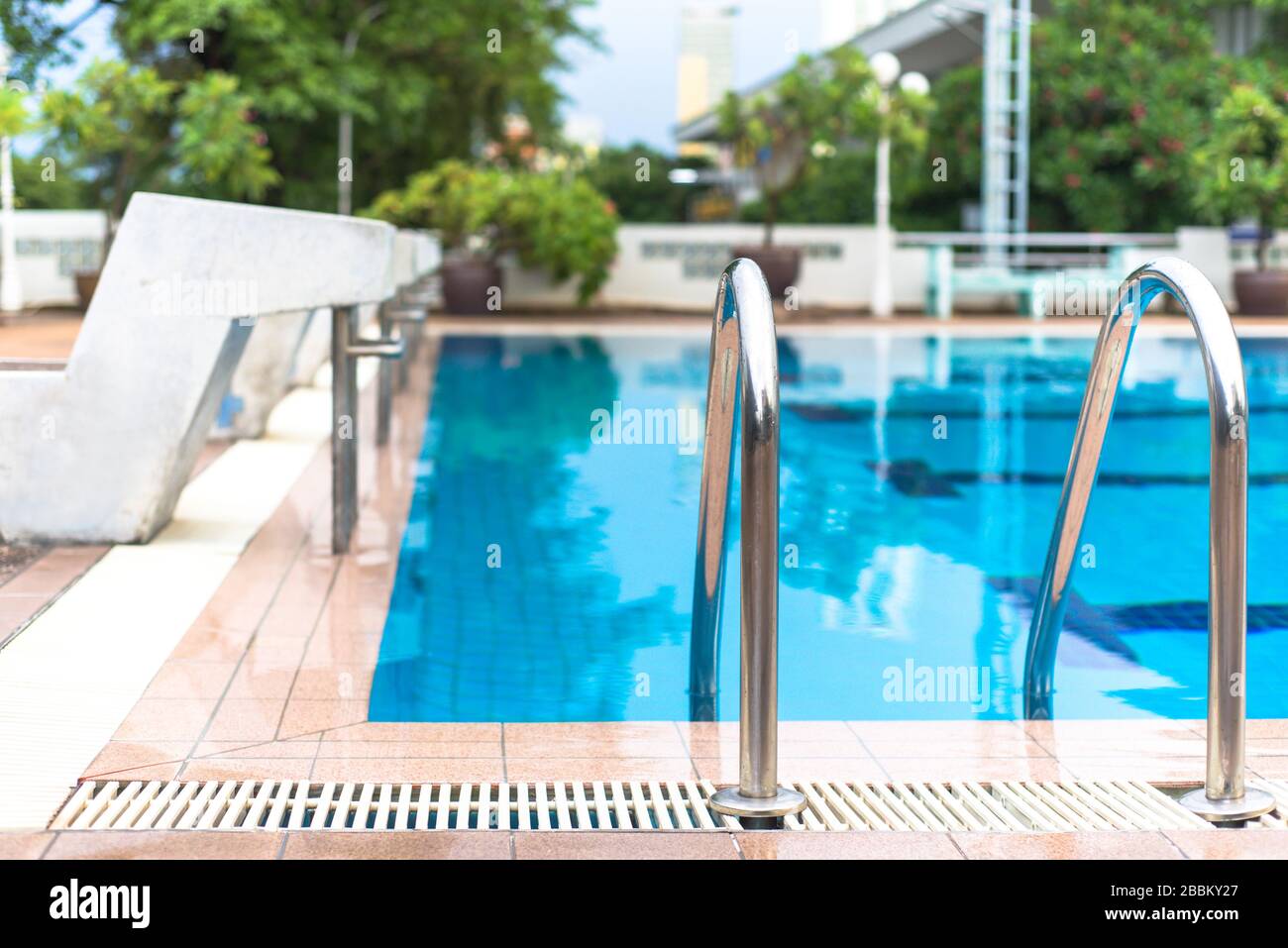 swimming pool with stair at sport center Stock Photo - Alamy