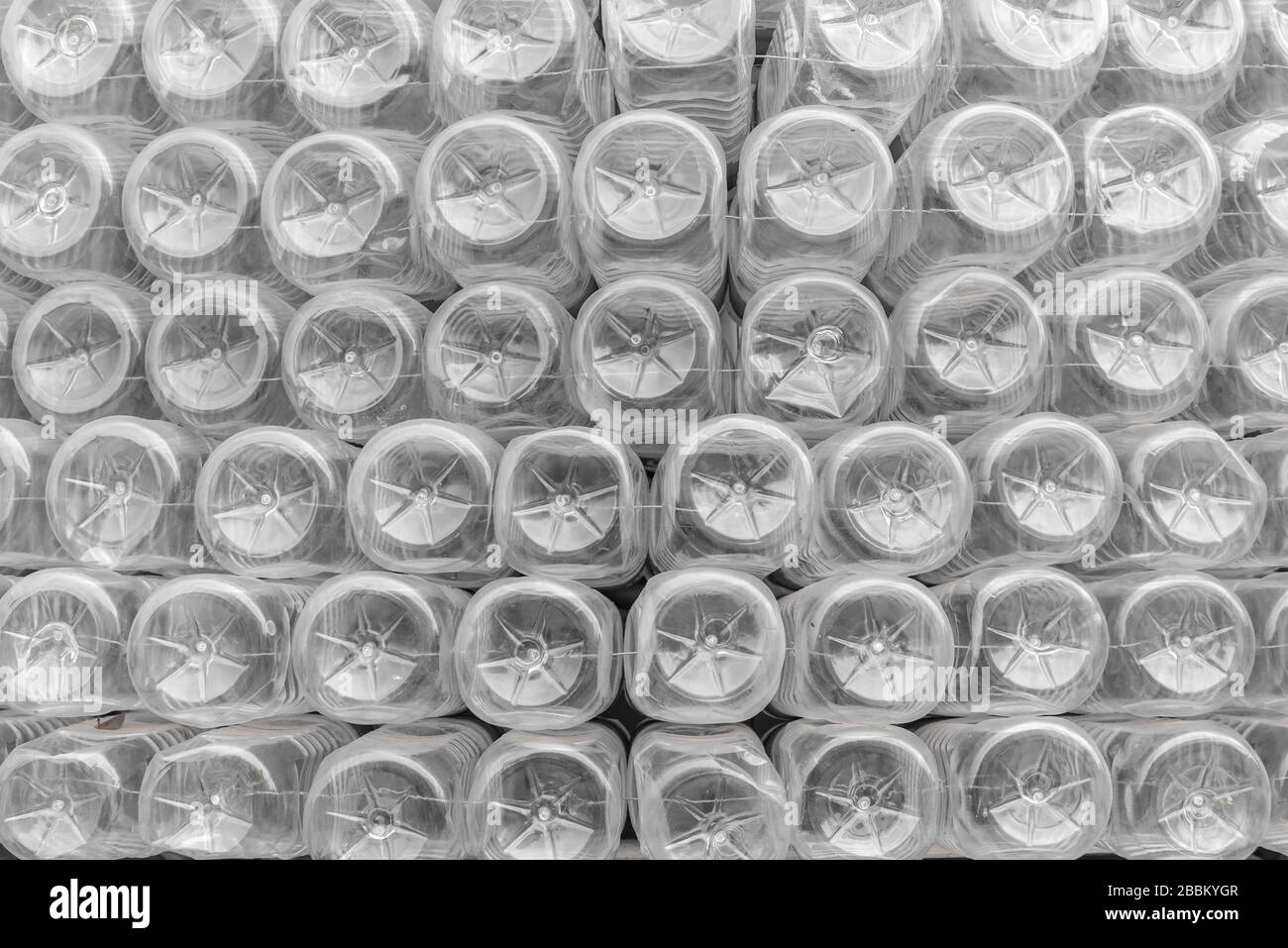 Stack of bottom plastic bottles texture for background Stock Photo - Alamy