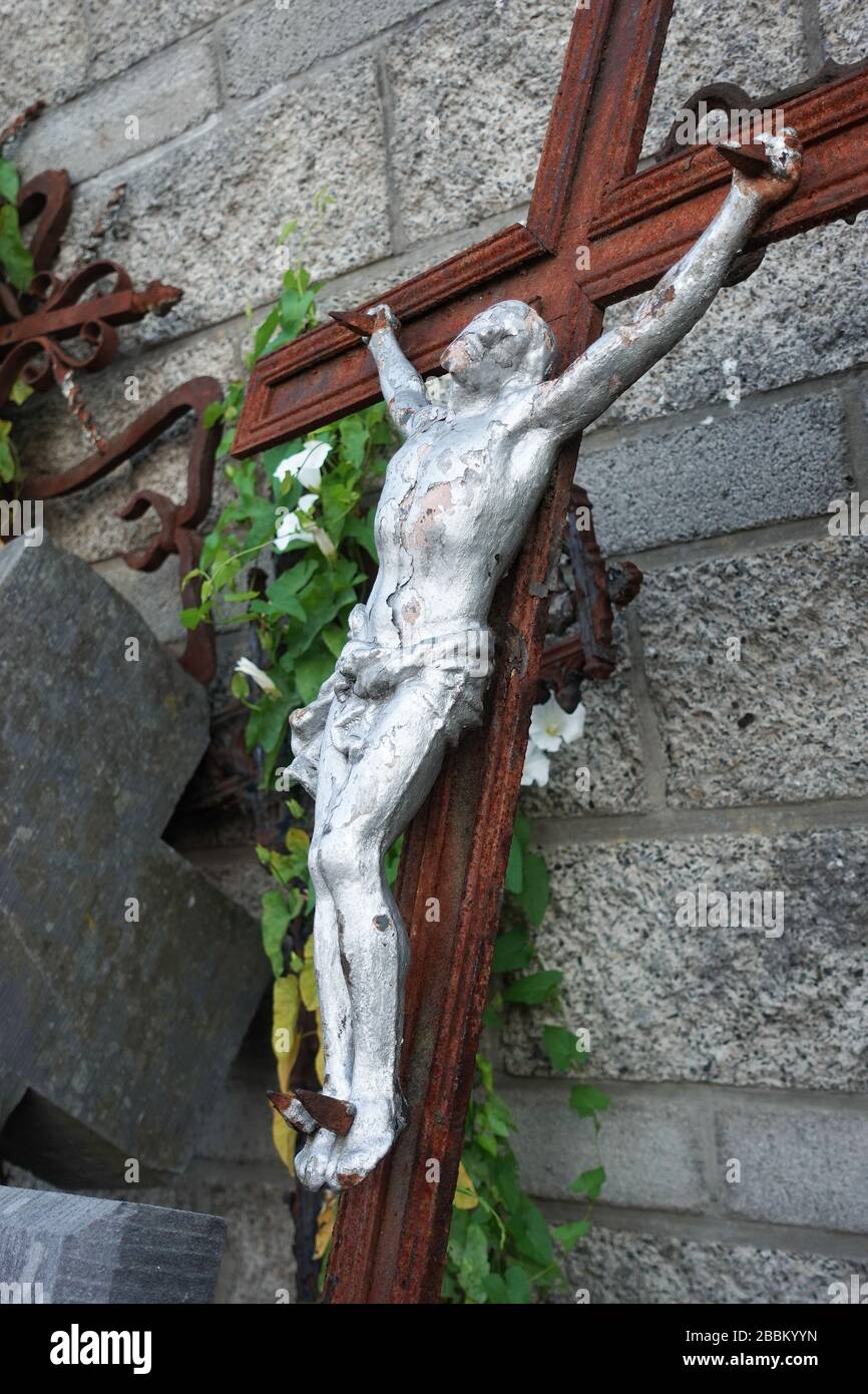 Old rusty metal Cross with Jesus Stock Photo - Alamy