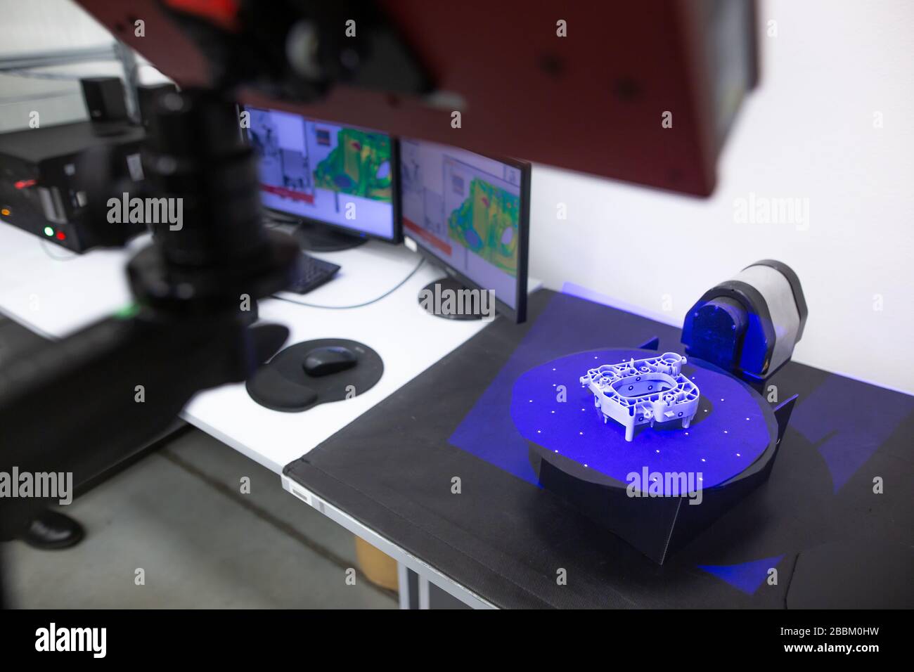 Professional 3D scanner scanning an industrial object plastic molding ...