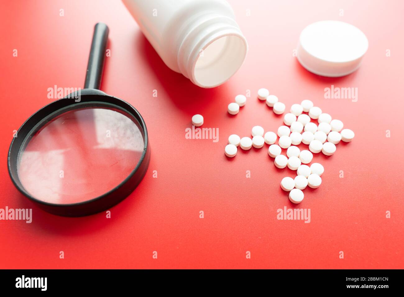 Medical, medicine stethoscope and pills on red background. Health care ...