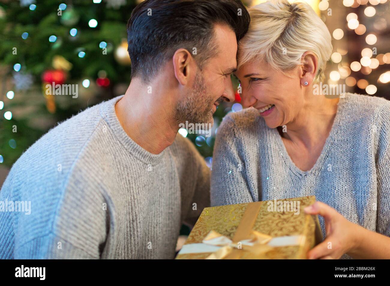 Couple together on Christmas Stock Photo - Alamy