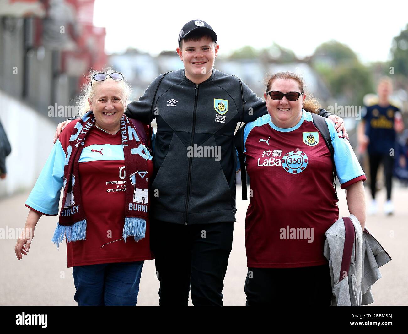 Burnley fans arrive for the match Stock Photo - Alamy