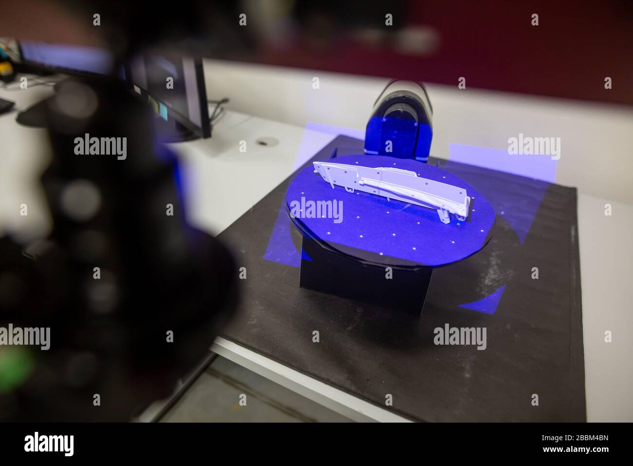Professional 3D scanner scanning an industrial object, plastic molding ...