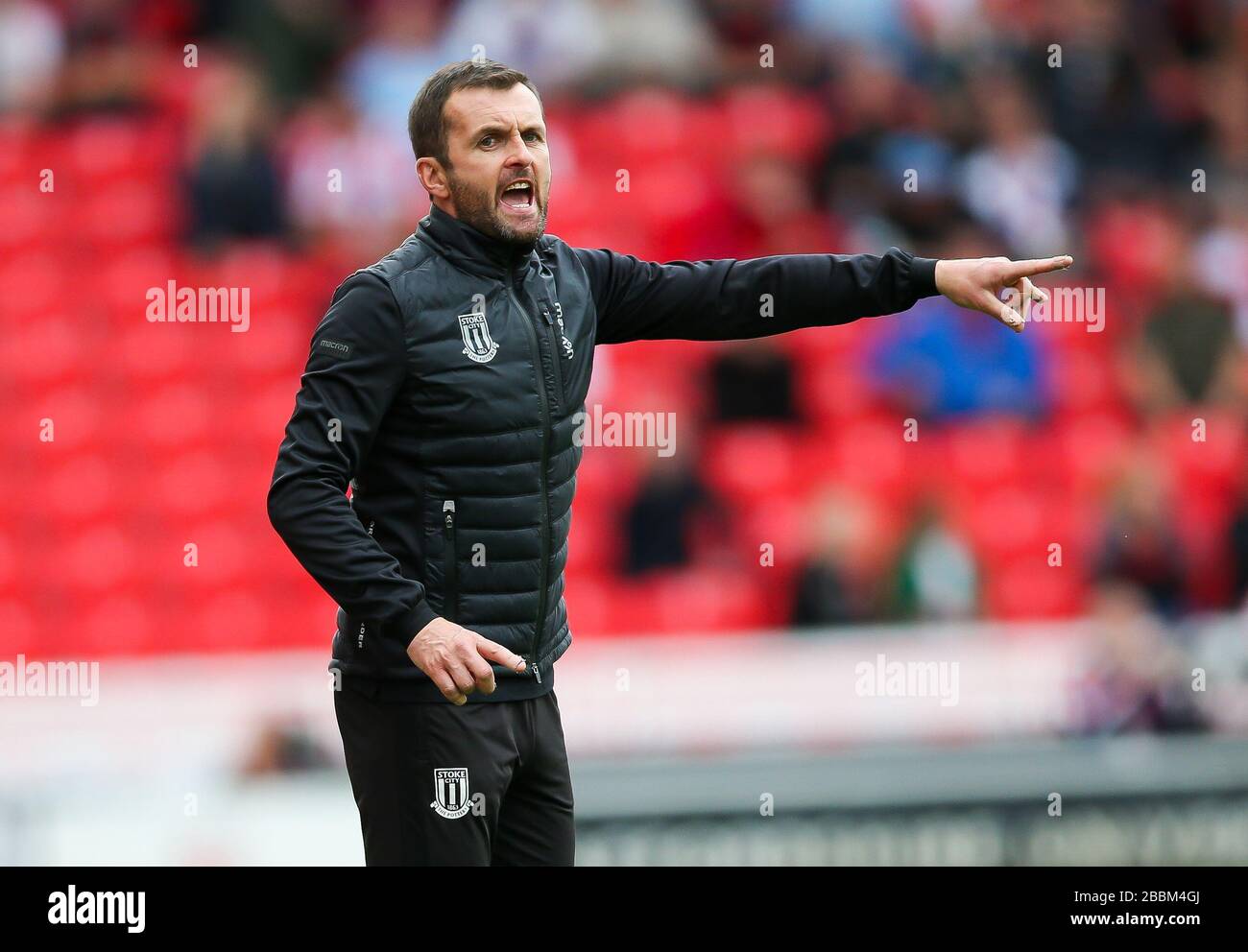 Stoke City manager Nathan Jones instructs his players Stock Photo - Alamy