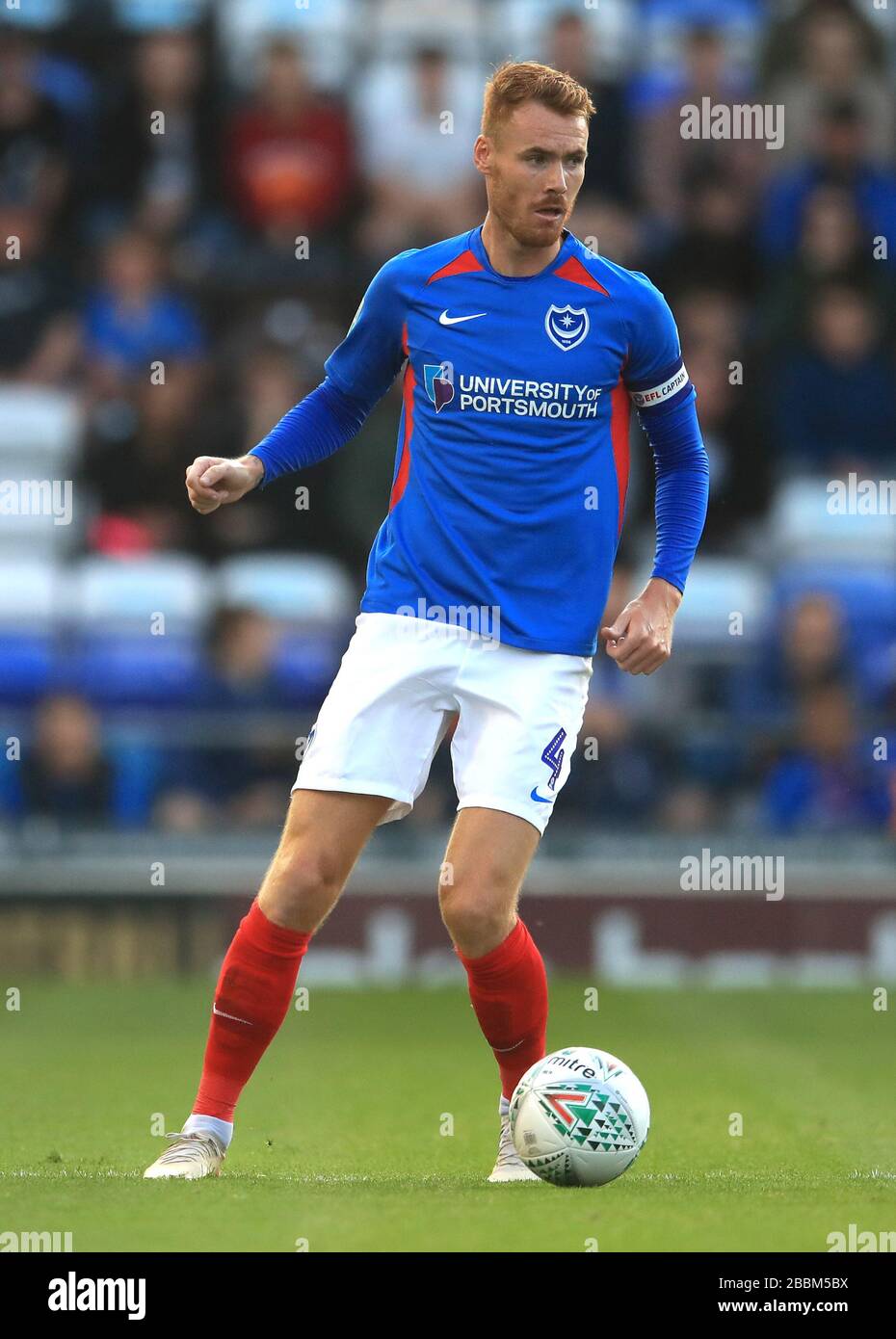 Portsmouth's Tom Naylor in action Stock Photo - Alamy