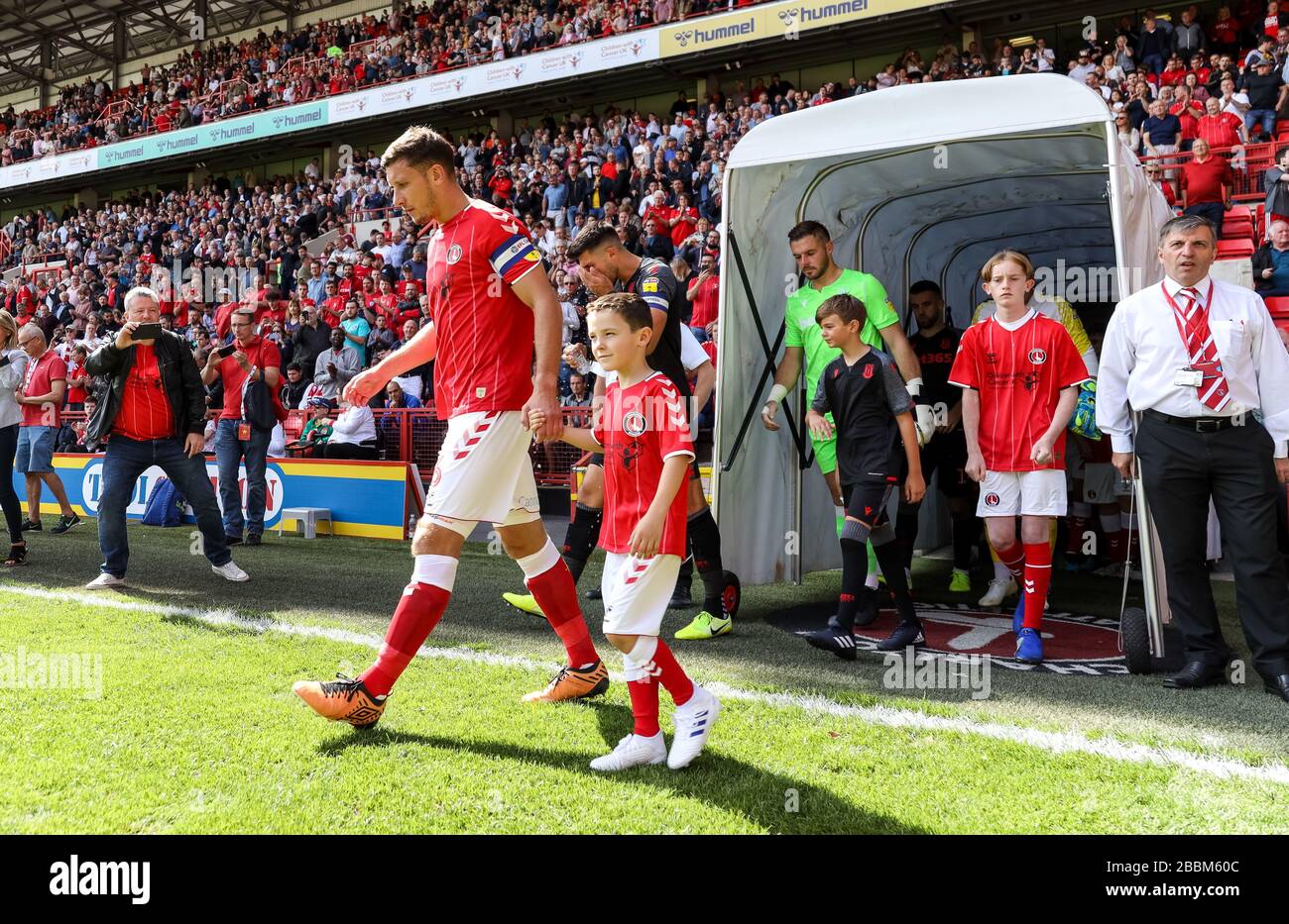Charlton Athletic's Jason Pearce leads the team out Stock Photo - Alamy