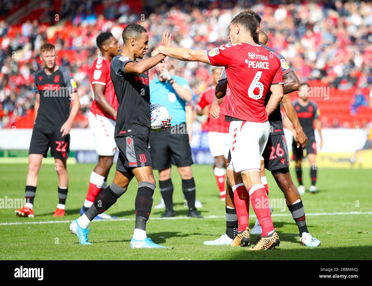 Stoke City's Tom Ince (left) and Charlton Athletic's Jason Pearce ...